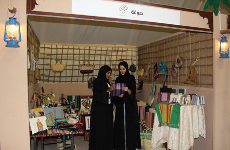 Emirati women weave bedouin tales into sweet delights at this market ...